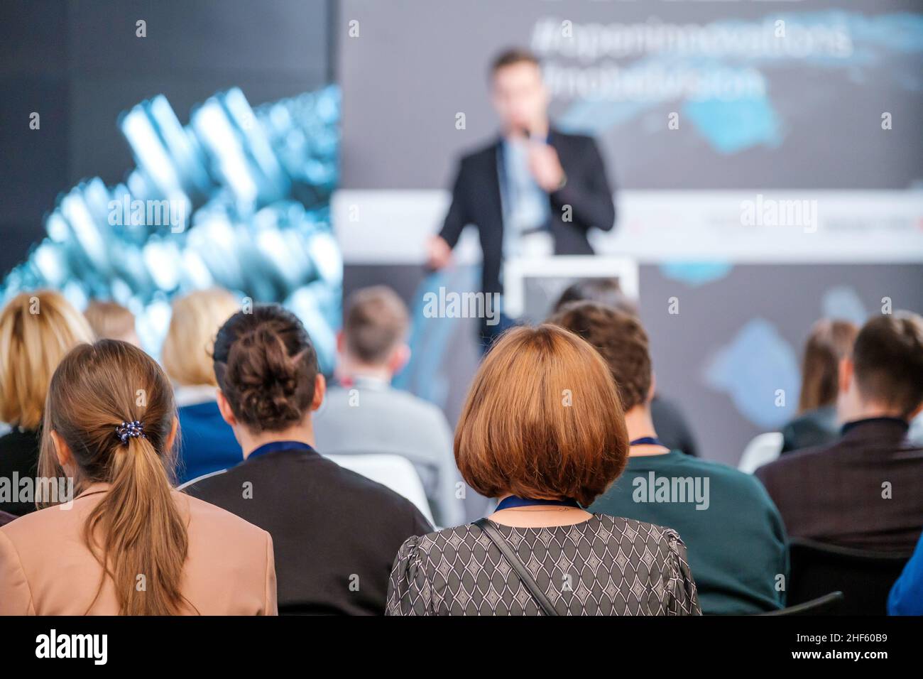 Audience watching presentation during business seminar Stock Photo - Alamy