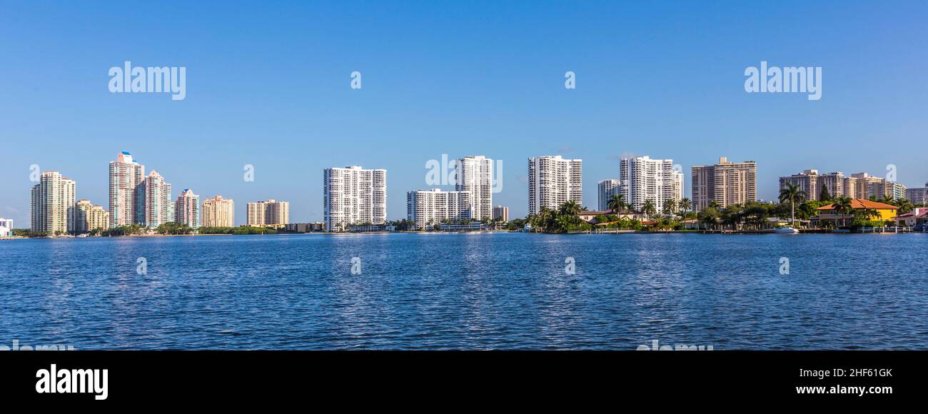 skyline of Miami with ocean under blue sky Stock Photo - Alamy