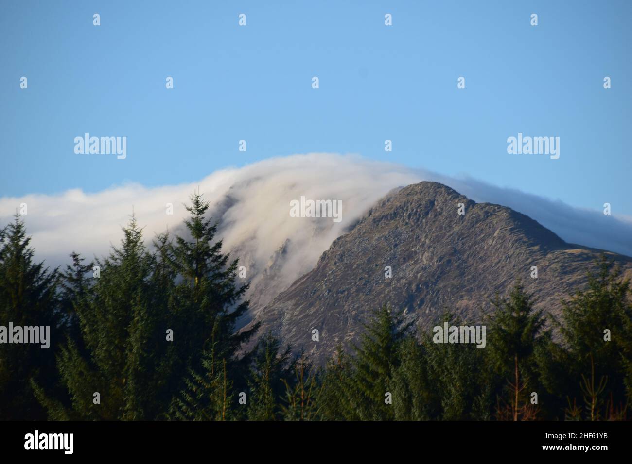 Mountains, Clouds, Forests, Blue skies and beautiful scenery on a trail ...
