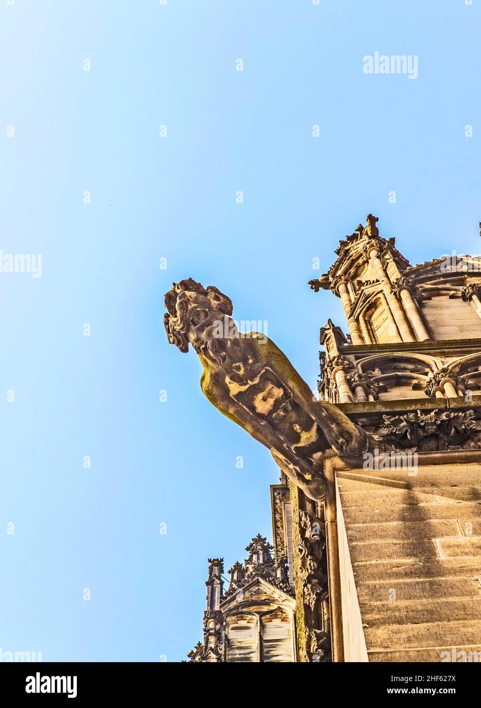 ugly gargoyle sculpture at the dome in cologne Stock Photo - Alamy