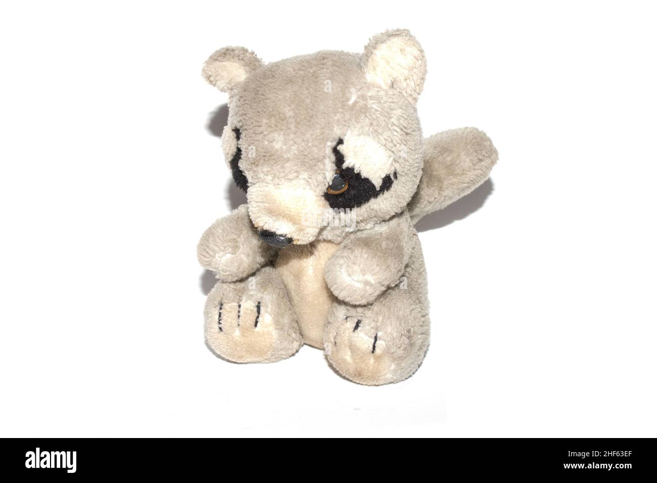 A Old vintage very worn and battered soft toy Stock Photo - Alamy