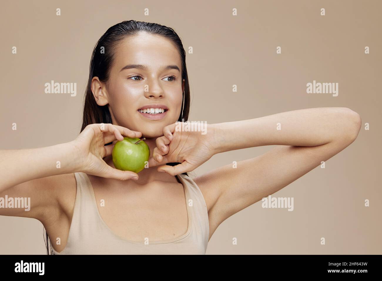 beautiful woman apple in hands posing fruit healthy food fresh close-up ...