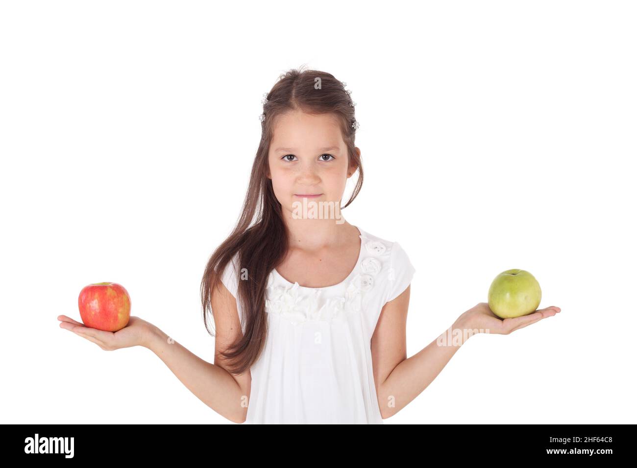 cute sweet little girl with two apples Stock Photo - Alamy