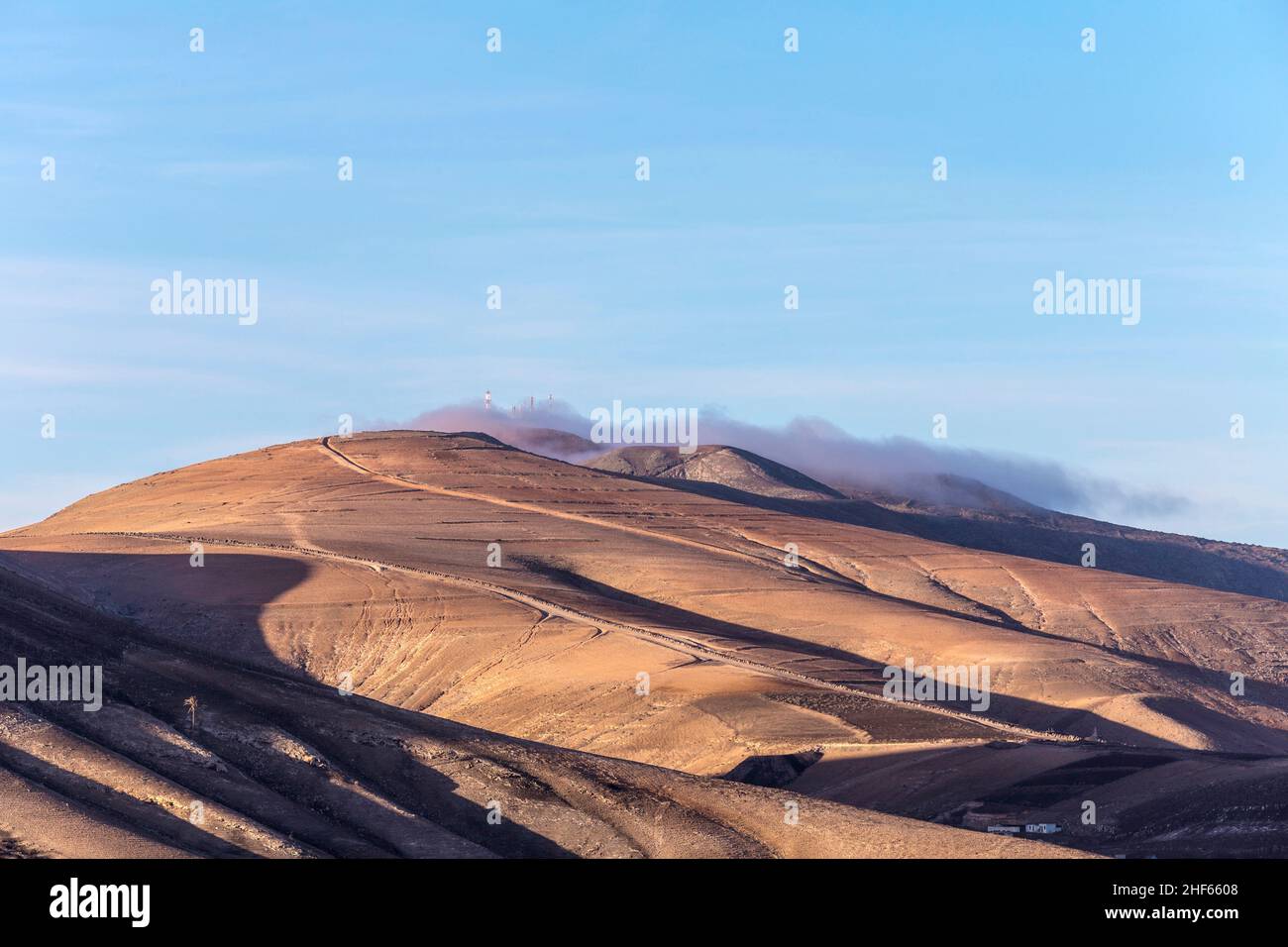 summit of volcano in Timanfaya national park in Lanzarote in morning ...