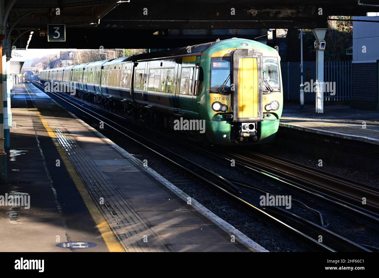 A Southern branded class 377 train at Horley railway station in Surrey ...