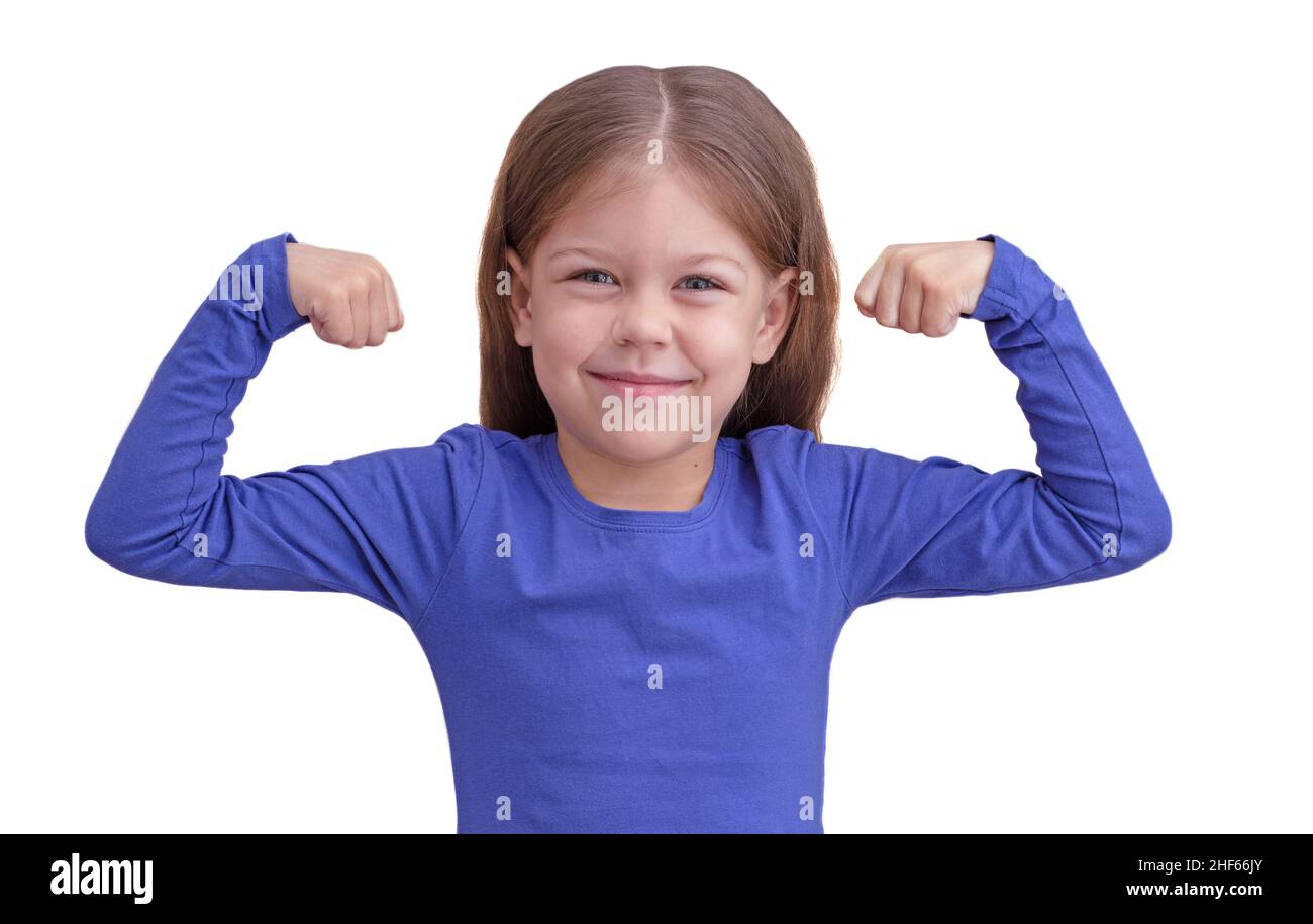 Happy and smiling child kid showing muscles raising arms as strongman ...