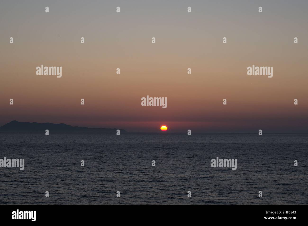 Sunset at Logas Beach at Peroulades, Corfu Island Stock Photo - Alamy