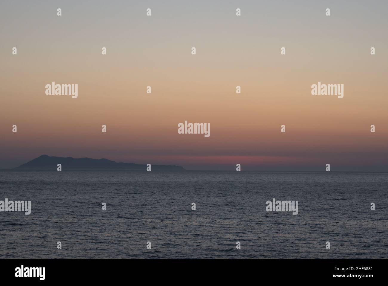 Sunset at Logas Beach at Peroulades, Corfu Island Stock Photo - Alamy