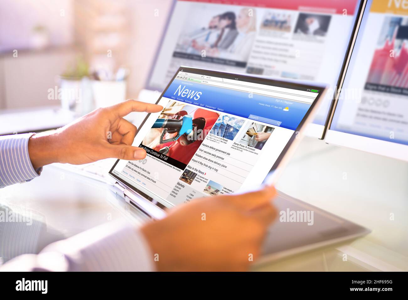 Laptop newspaper black background hi-res stock photography and images ...