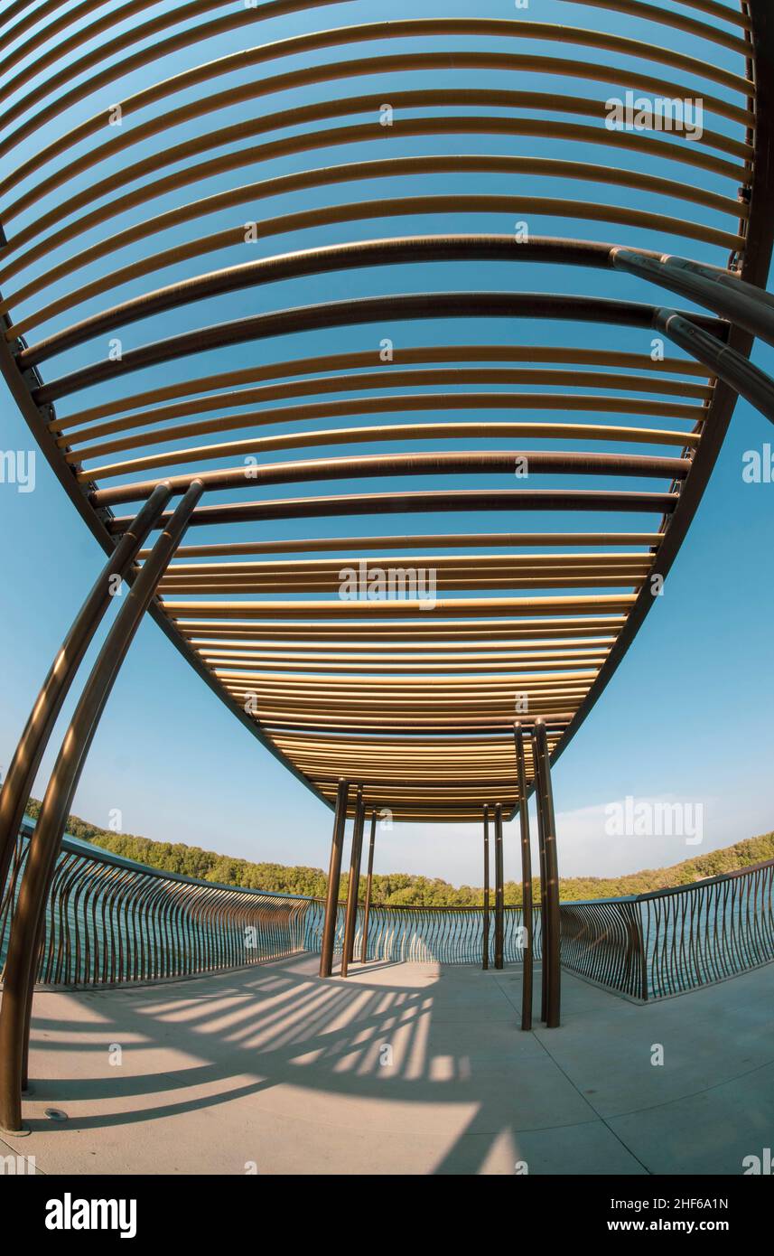 A portrait artistic fisheye view of a pavilion looking over the water ...