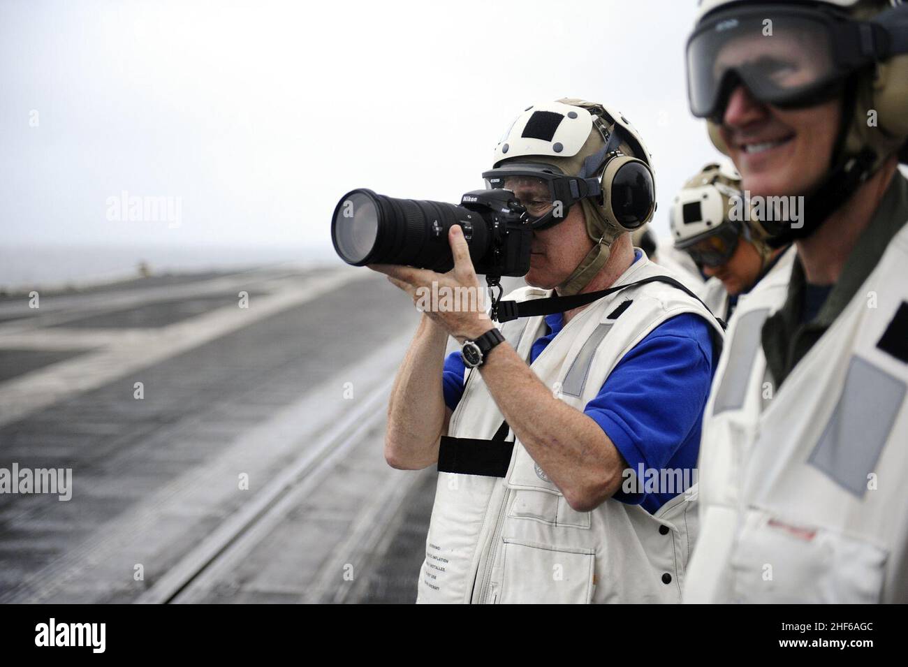 Secretary of the Navy Ray Mabus takes photos of flight operations on ...