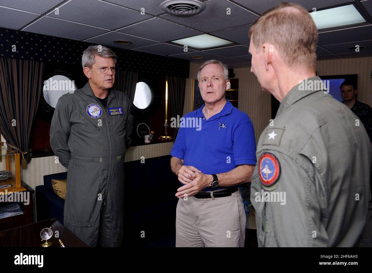 Secretary of the Navy Ray Mabus, center, speaks with U.S. Navy Capt ...