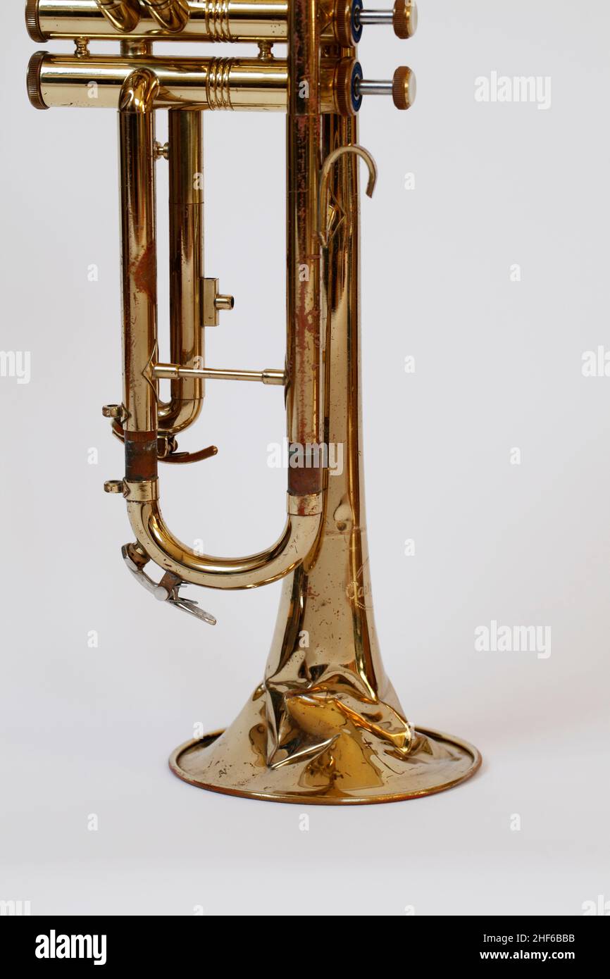 Trumpet with a crumpled damaged bell Stock Photo - Alamy