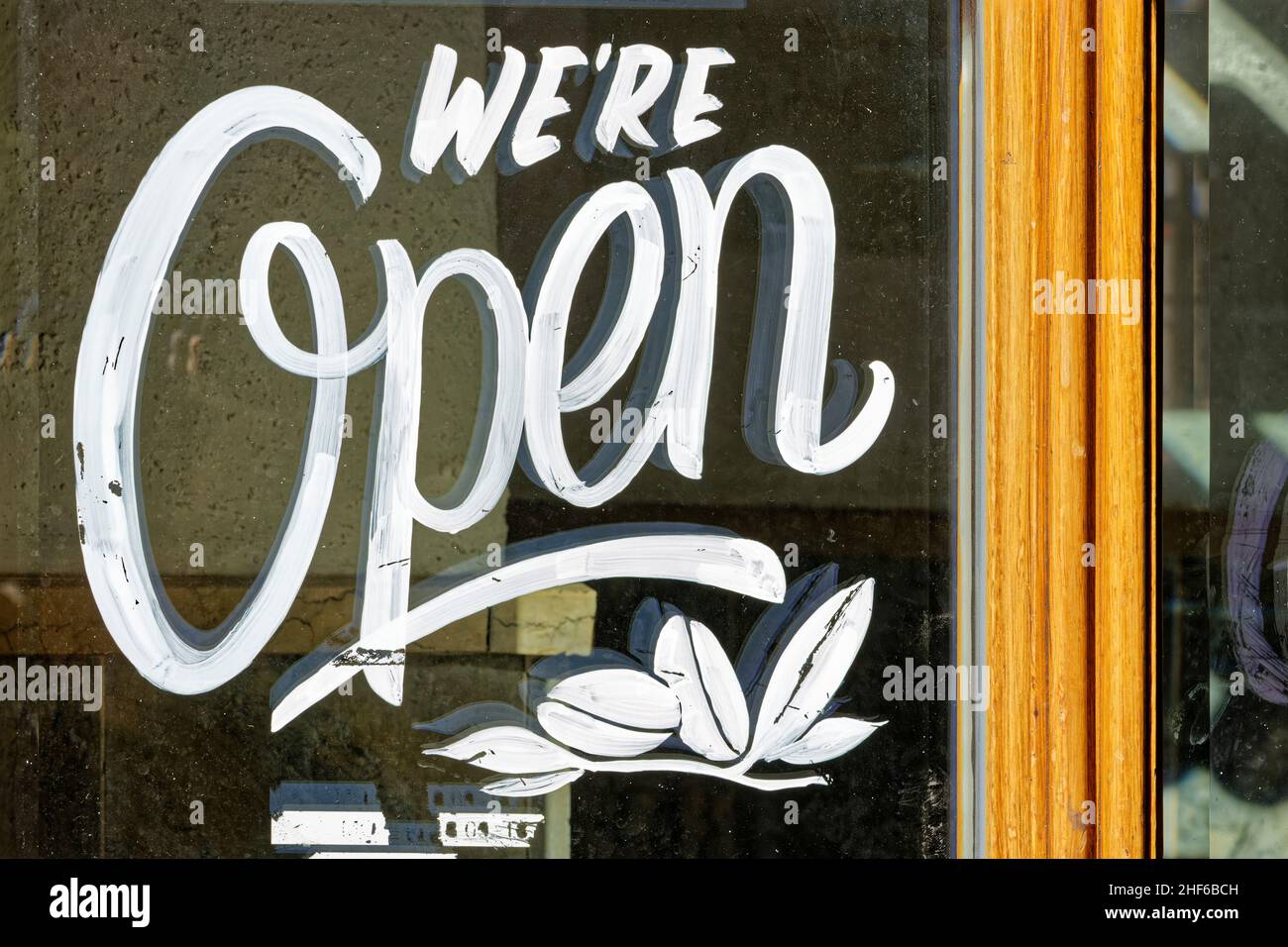 Cafe, window pane, lettering –€œWe–´re open–€ Stock Photo - Alamy