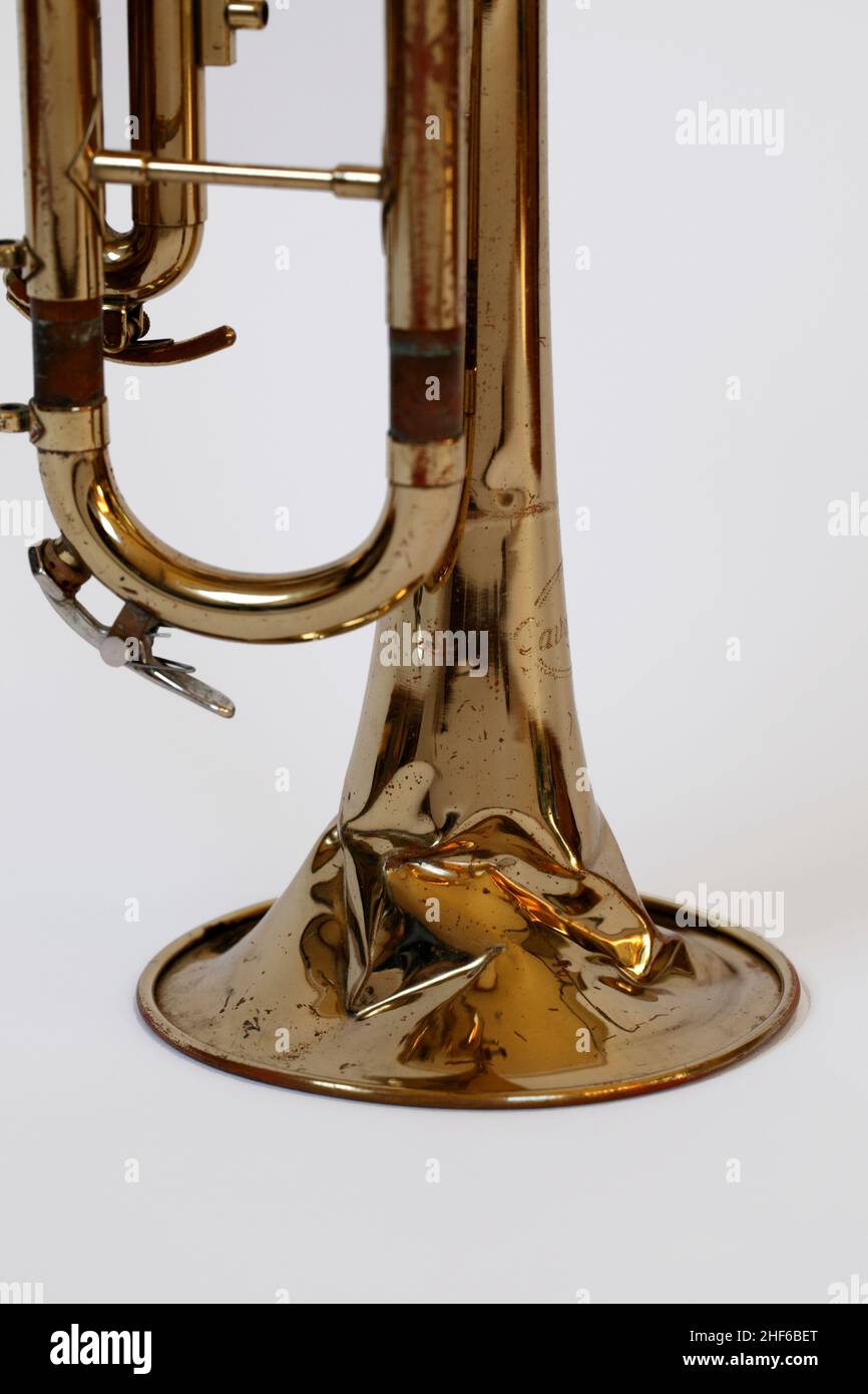 Trumpet with a crumpled damaged bell Stock Photo - Alamy