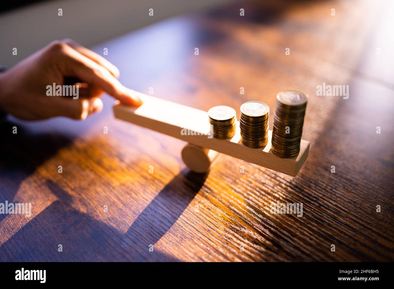 Balance scales money hi-res stock photography and images - Alamy