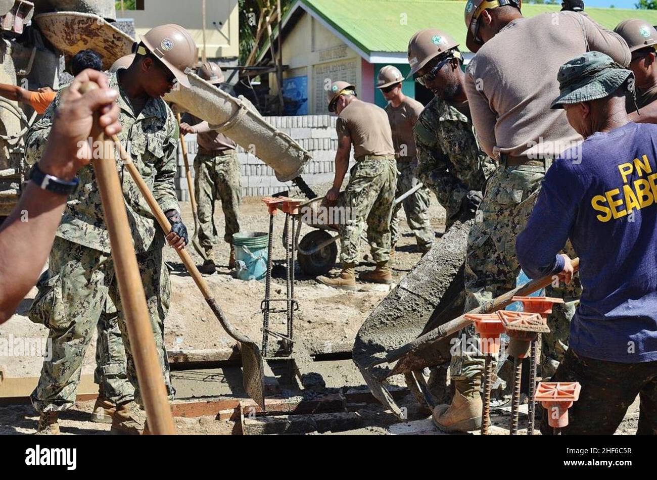Seabees from Naval Mobile Construction Battalion (NMCB) 5 and Republic of Philippines Navy ...