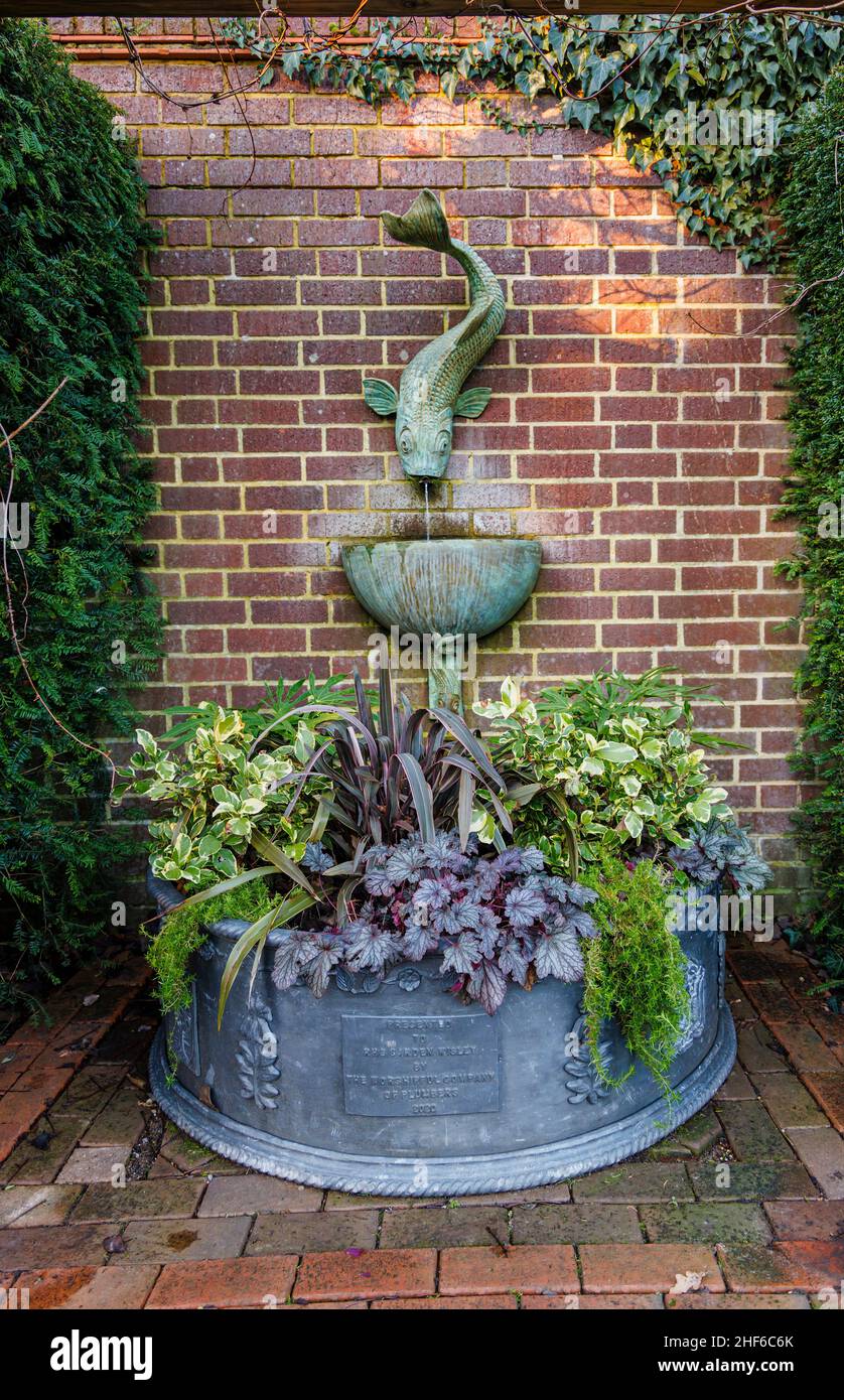 A decorative fountain in the Walled Gardens, RHS Garden, Wisley, Surrey ...