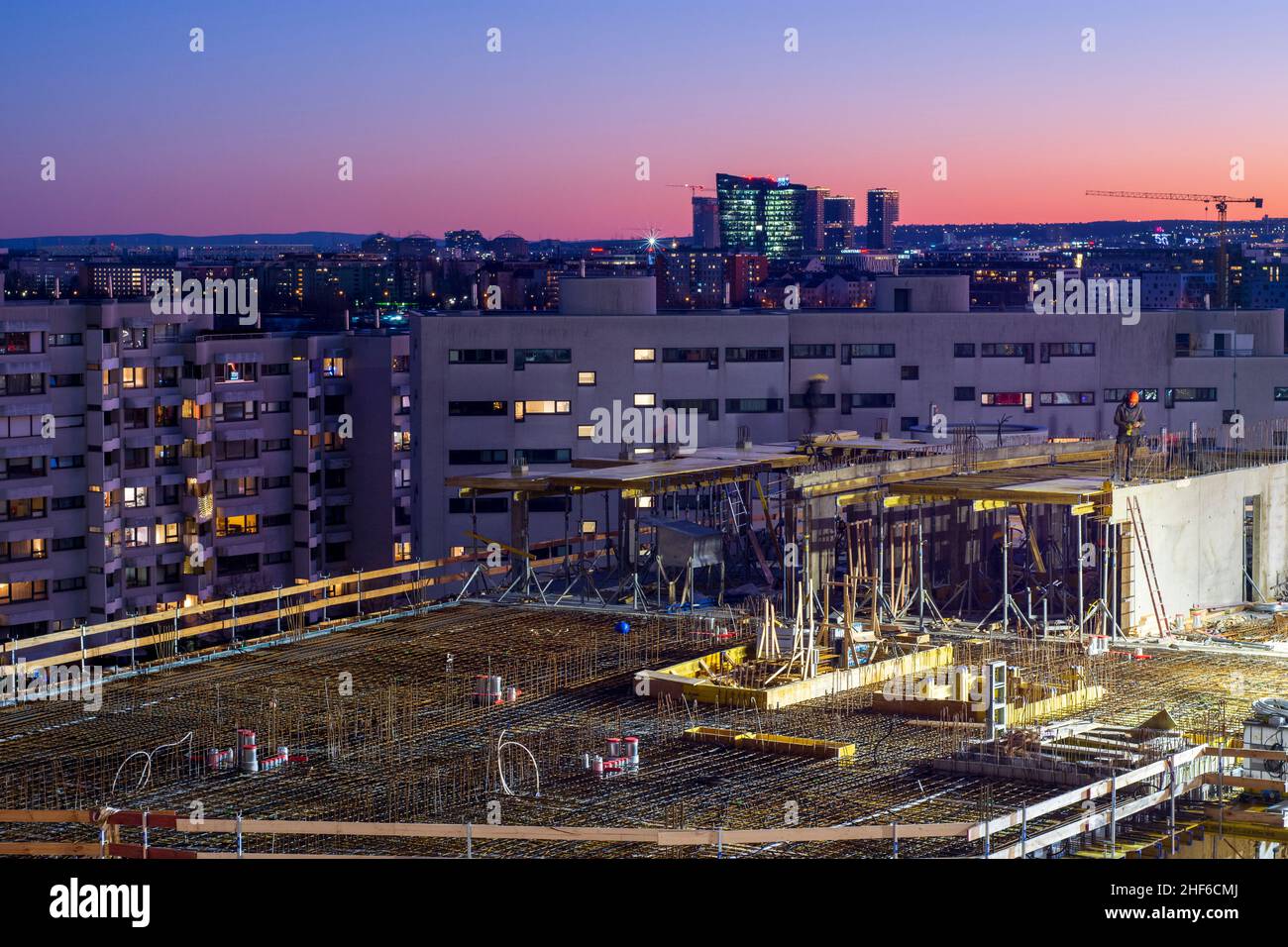Wien, Vienna: construction site of a house in Vienna, worker, OMV ...