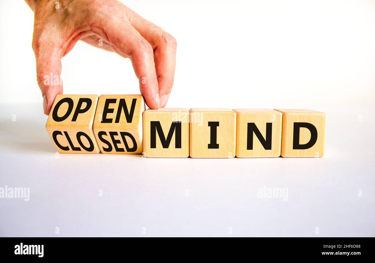 Open or closed mind symbol. Businessman turns cubes and changes concept ...