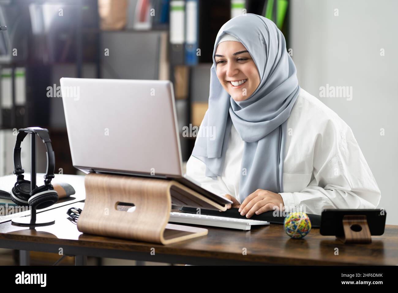 Woman Wearing Hijab In Virtual Interview Meeting. Online Conference ...