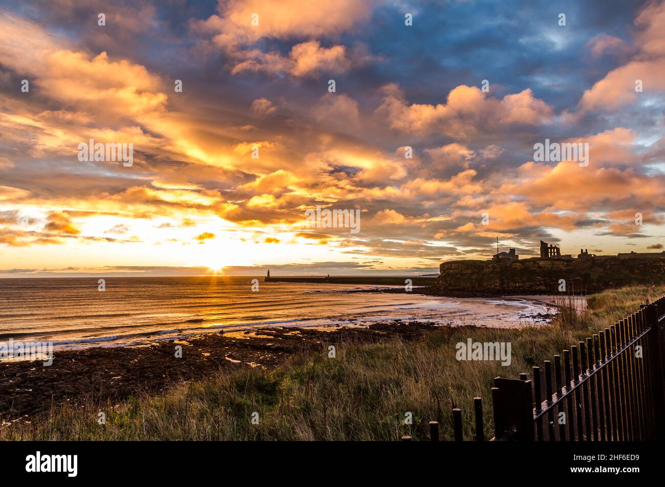 beautiful sunrise at Tynemouth's King Edward's Bay with the sunlight ...