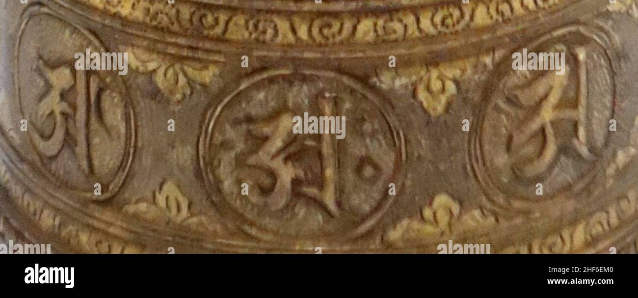 Script detail, Buddhist ritual bell with five-pronged vajra handle ...
