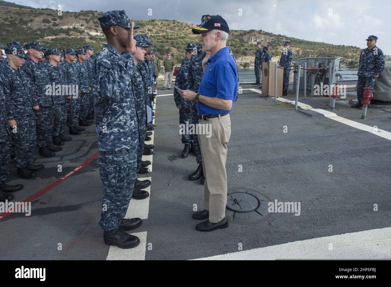 Secretary of the Navy Ray Mabus administers the oath of enlistment to U ...