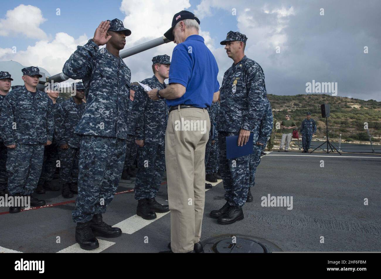 Secretary of the Navy Ray Mabus administers the oath of enlistment to U ...
