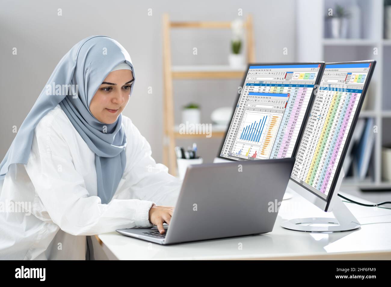 Analyst Working With Spreadsheet Business Data On Computer Stock Photo ...