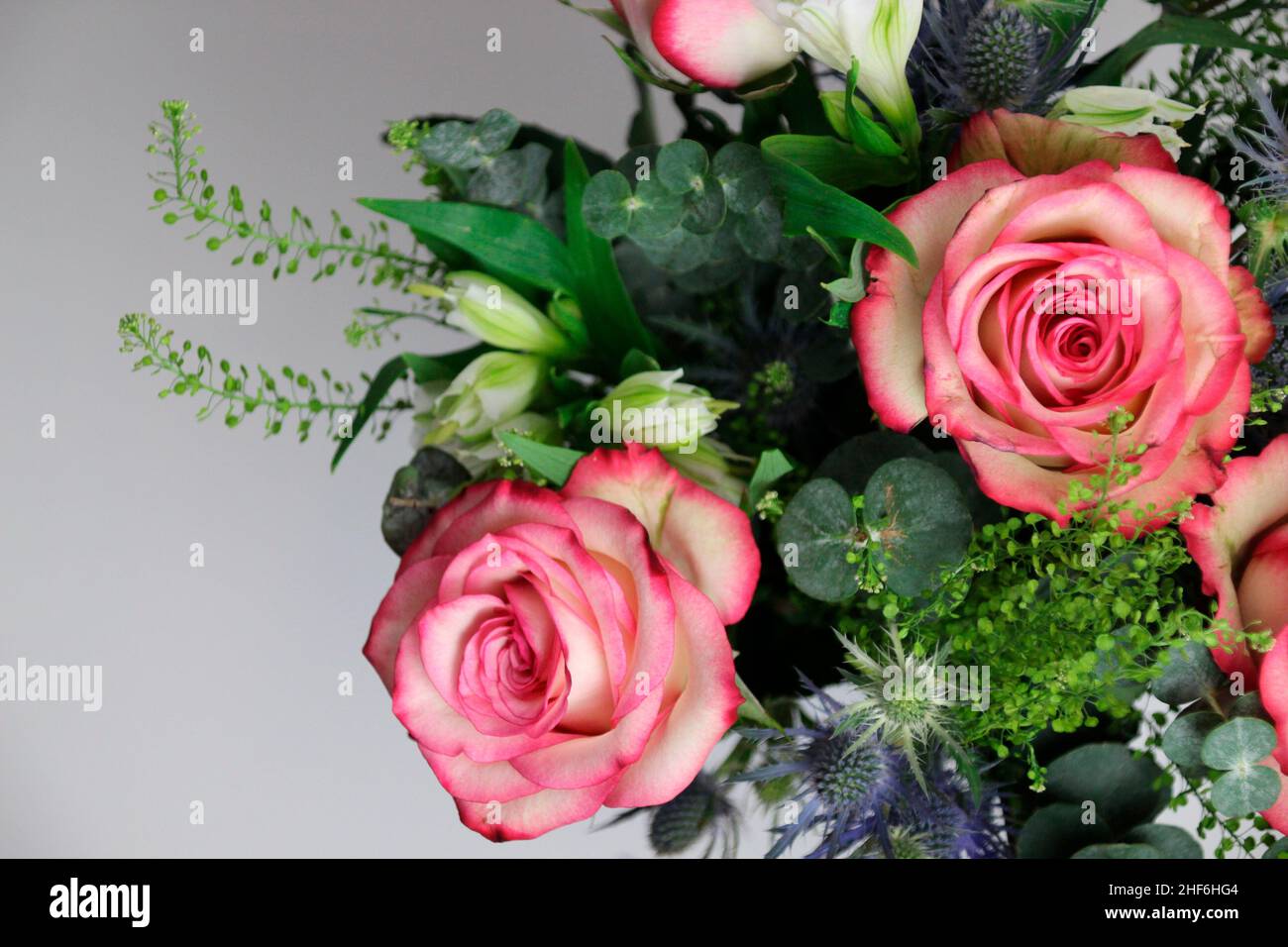 Bouquet with pink roses, close-up Stock Photo - Alamy