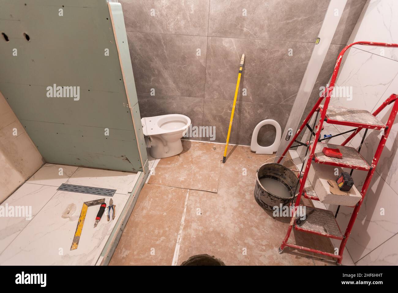 bathroom renovation and tiling, construction Stock Photo - Alamy