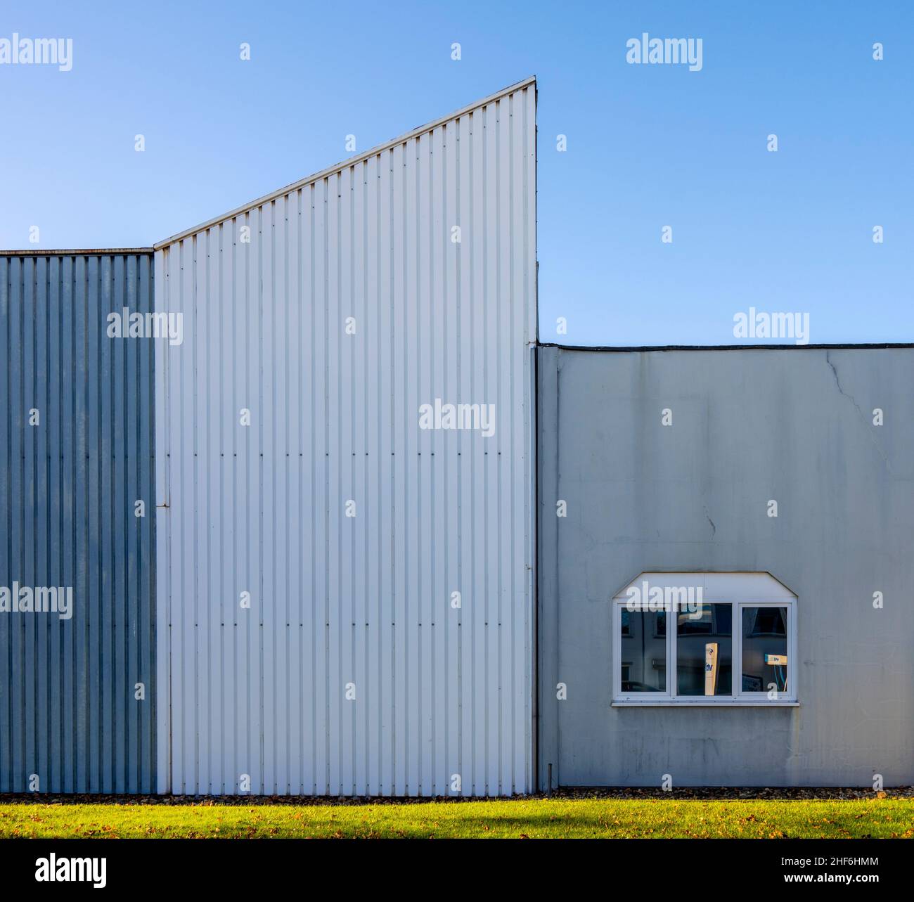 Warehouse, industrial area, blue sky Stock Photo - Alamy