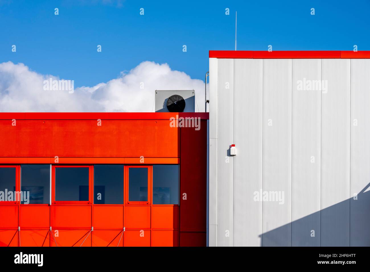 red building, warehouse, blue sky, clouds, commercial area Stock Photo ...
