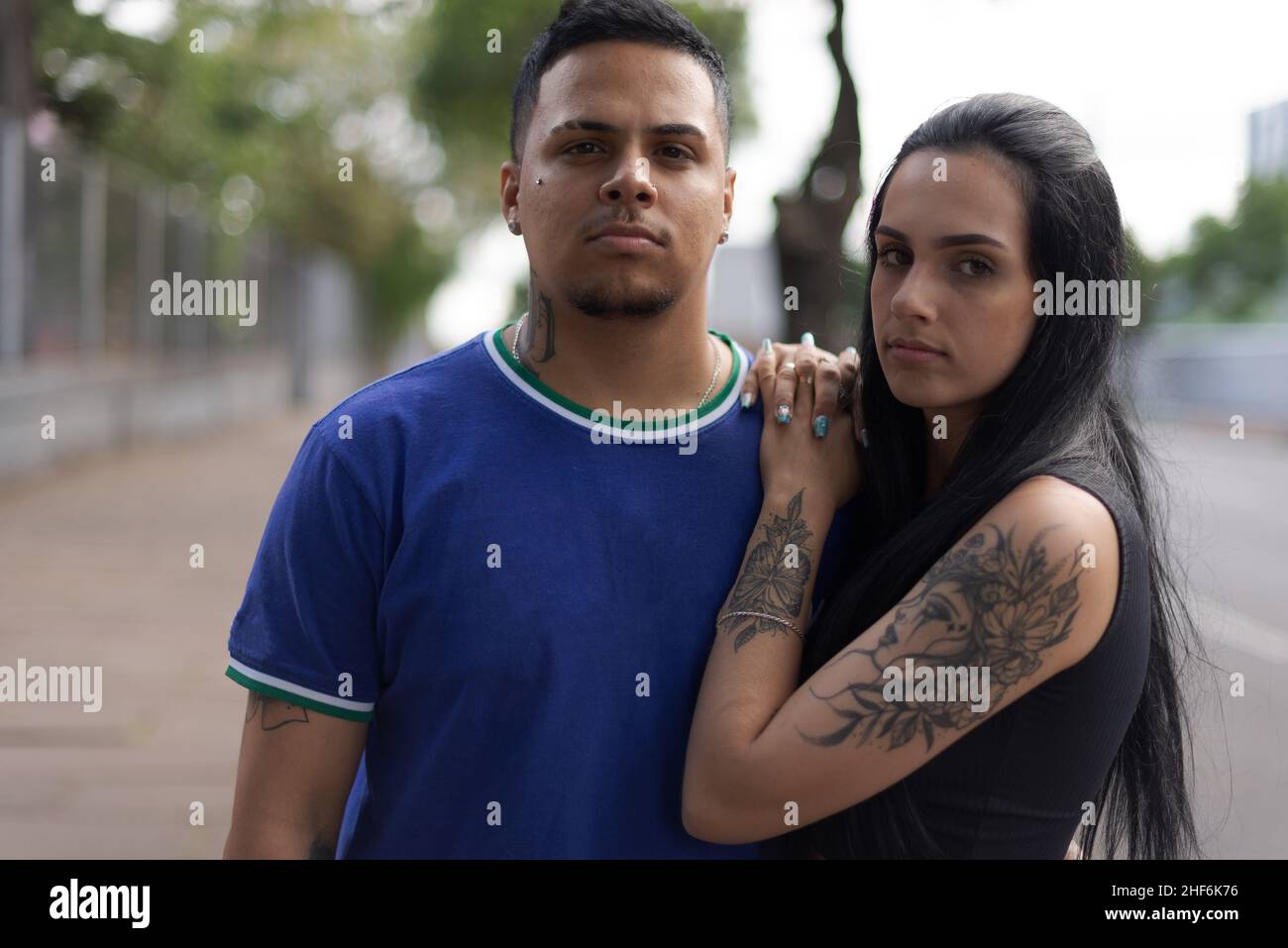 Valentines latin couple outdoor in the city or urban background smiling ...