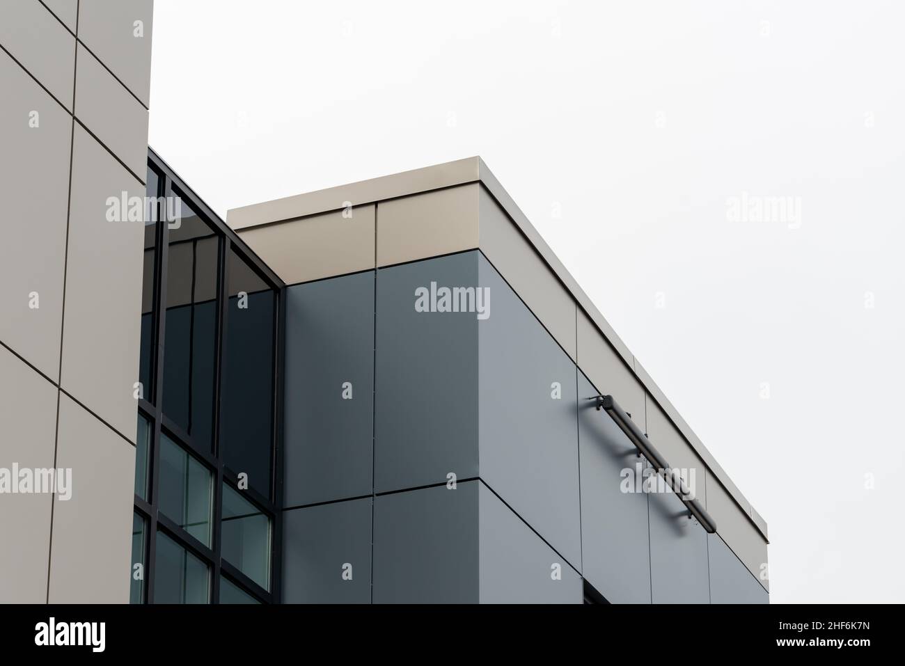 The exterior wall of a contemporary commercial style building with ...