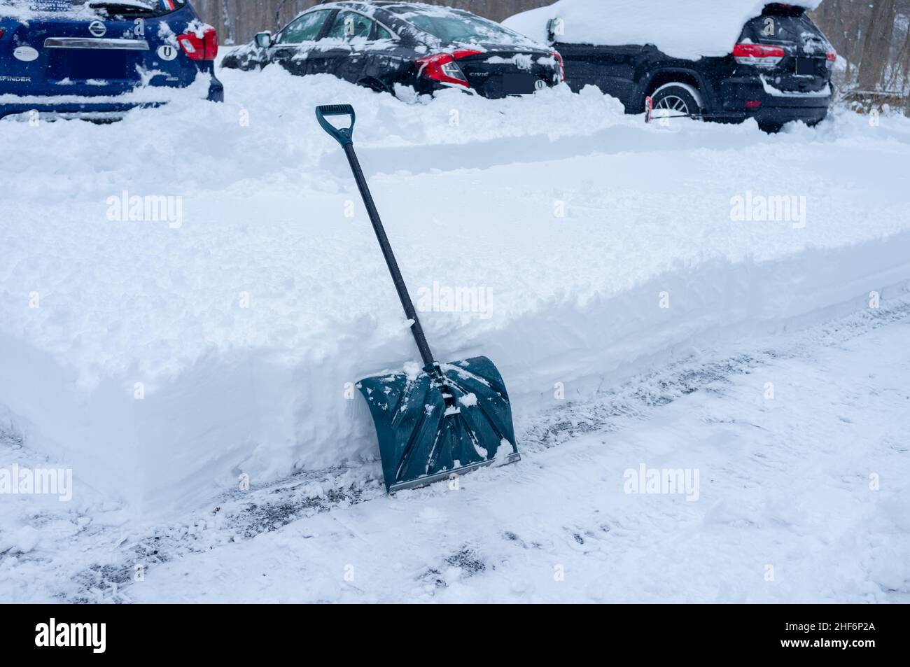 digging out the cars after a snow storm Stock Photo - Alamy