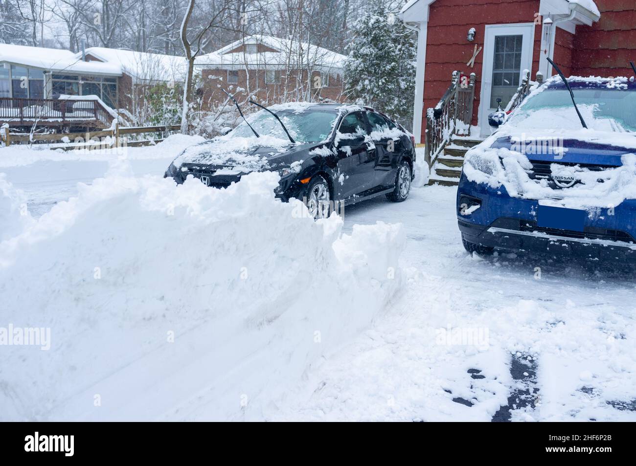 digging out the cars after a snow storm Stock Photo - Alamy