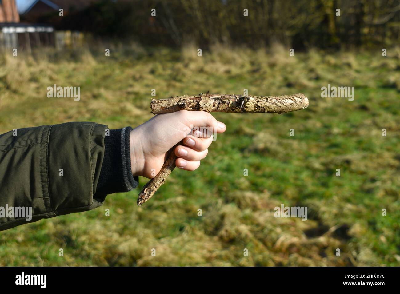Hand holding pointing stick hi-res stock photography and images - Alamy