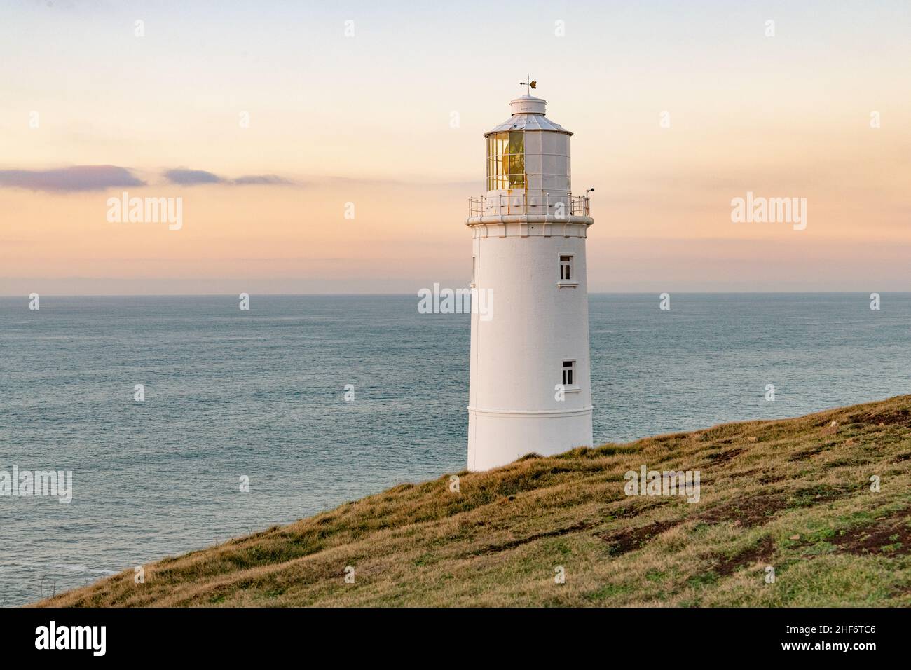 Lighthouse at dusk on the North Cornish coast Stock Photo - Alamy