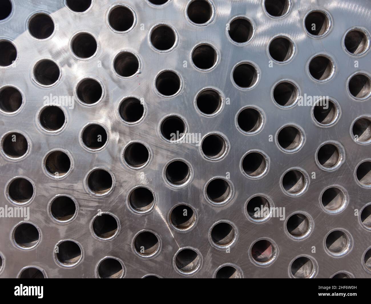 End plate of a shell and tube condenser at an industrial workshop. The ...