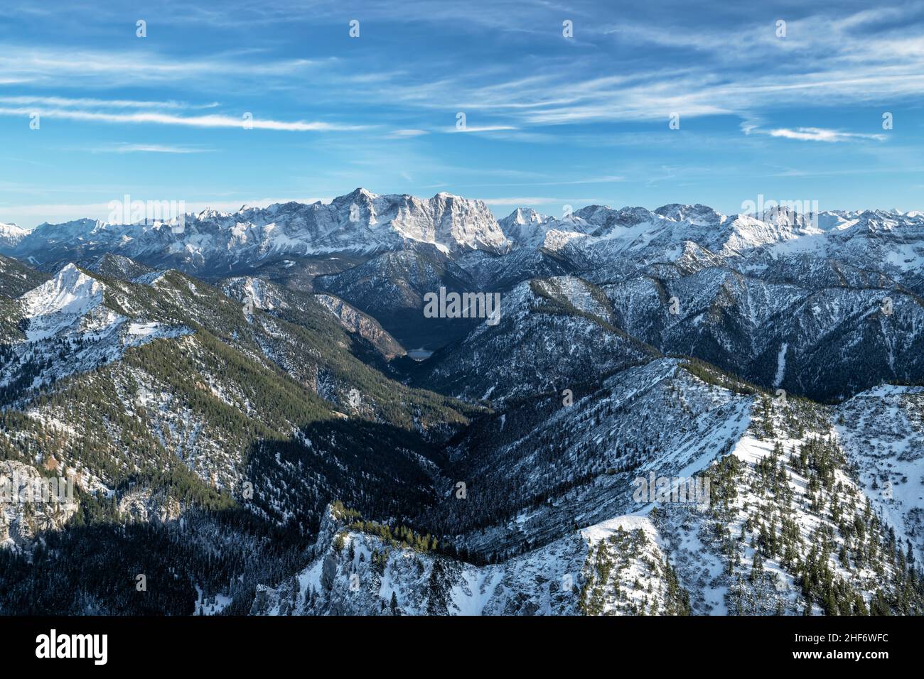 Early winter snowy alpine mountain landscape on a sunny autumn day ...