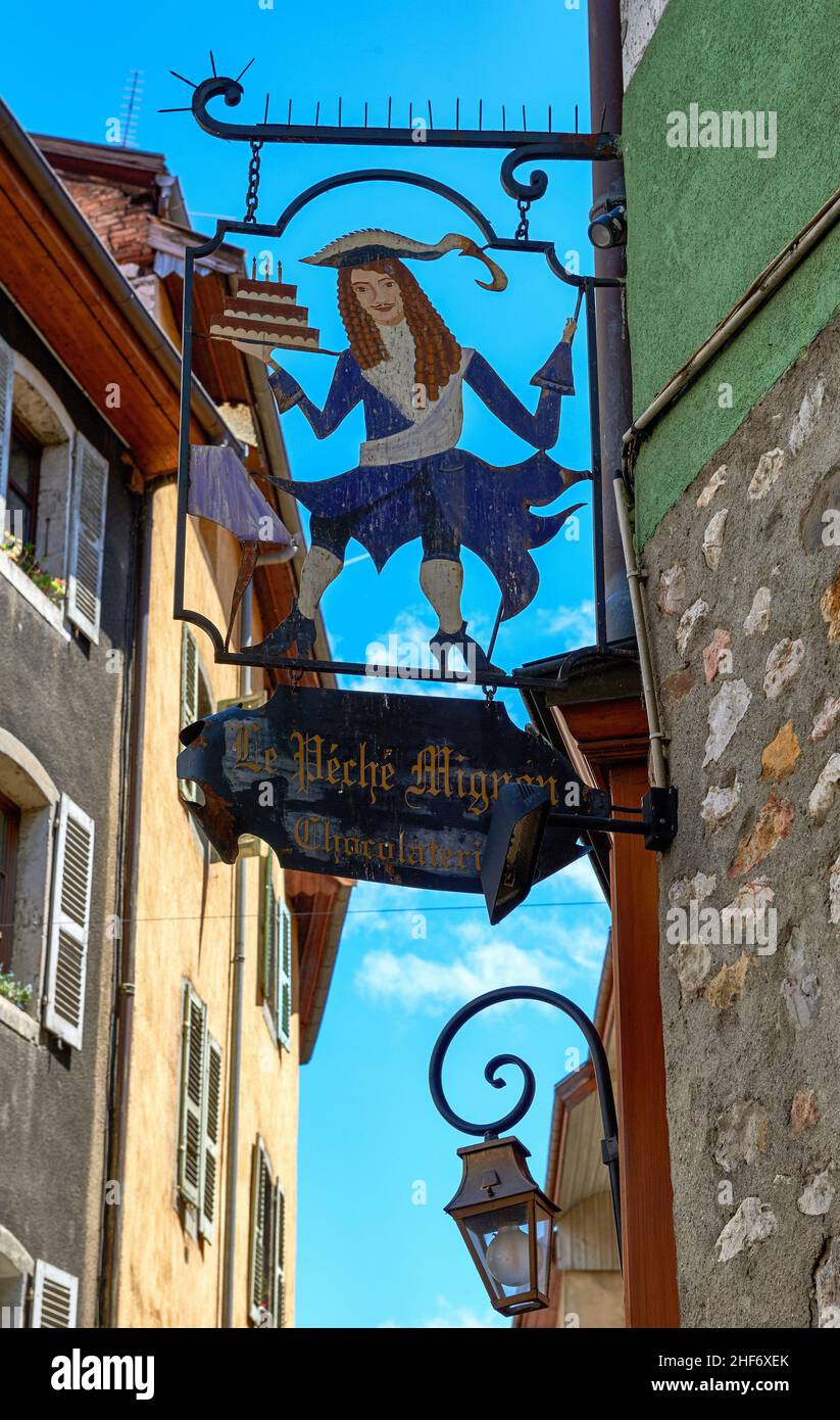 Cute street shop sign in Annecy Stock Photo - Alamy