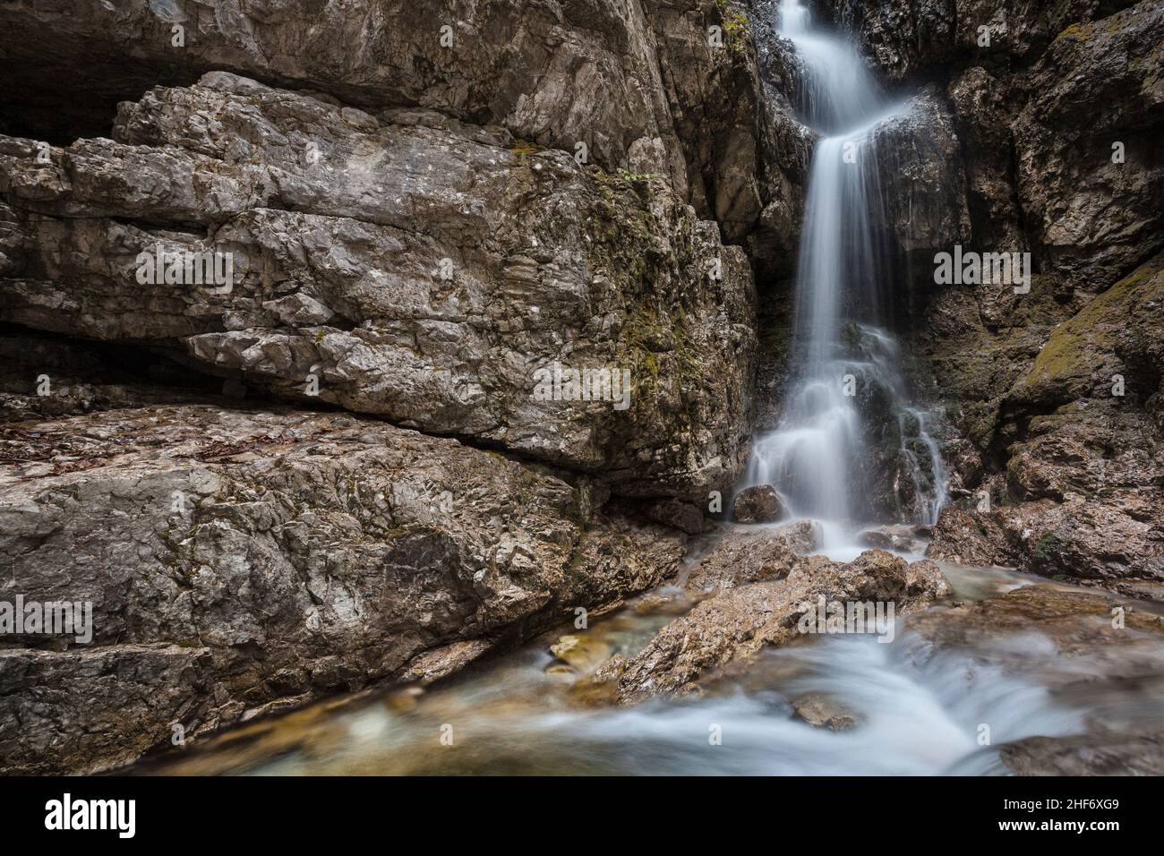 A natural waterfall at the bottom of the gorge of the Val di Piero ...
