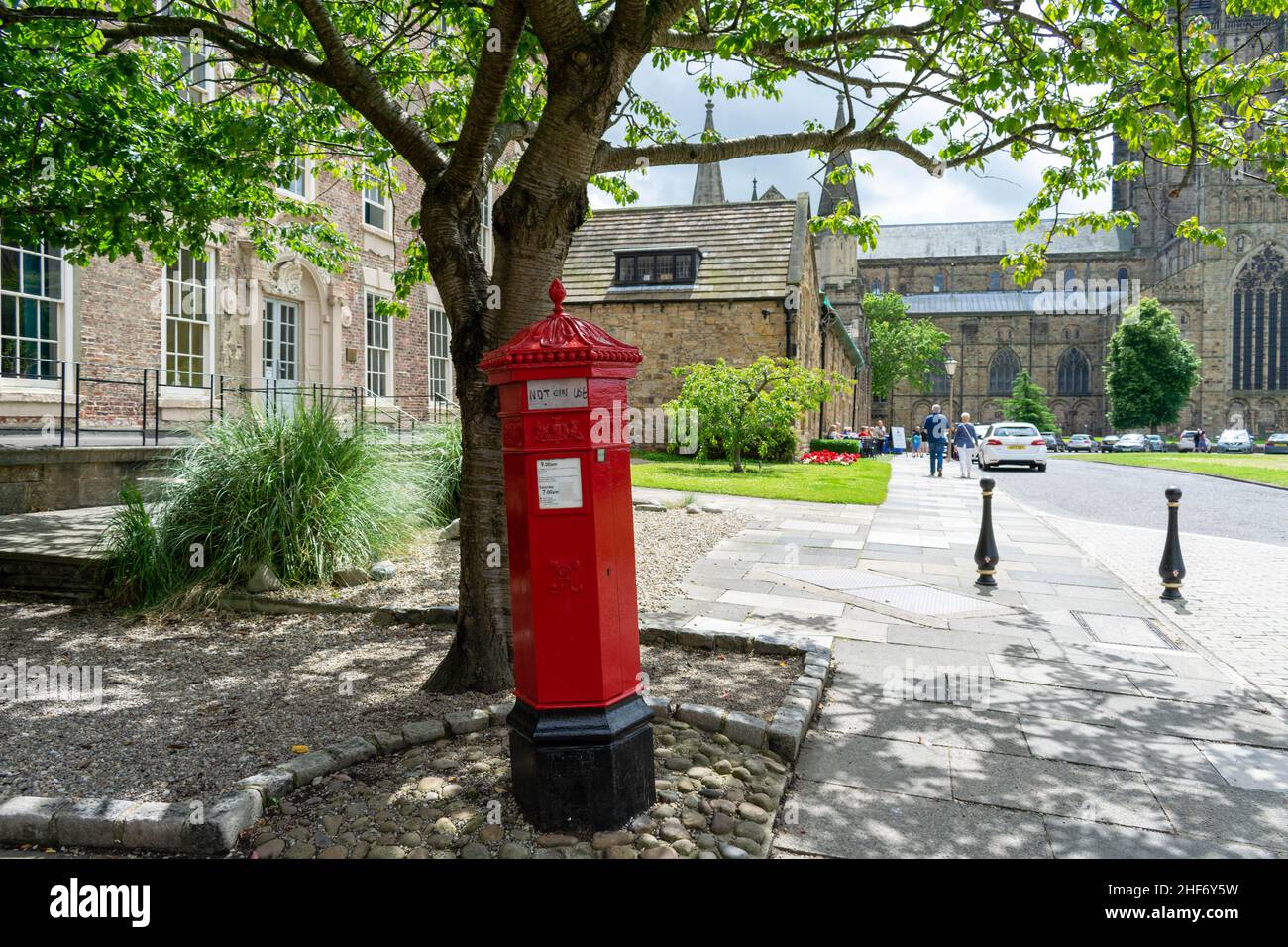 Durham, UK - 14th July 2019: Traditional red post box that sits wonky ...