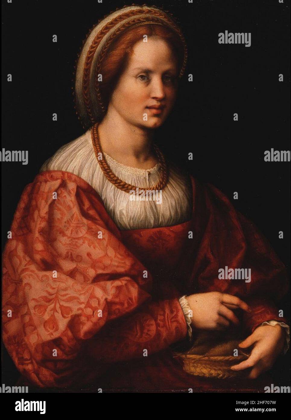 Woman with a basket of spindles hi-res stock photography and images - Alamy