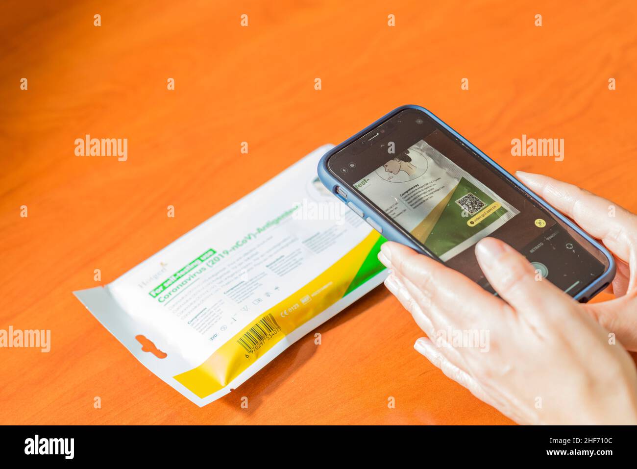 Seville. Spain. 28 December, 2021. Close-up of a smartphone scanning ...