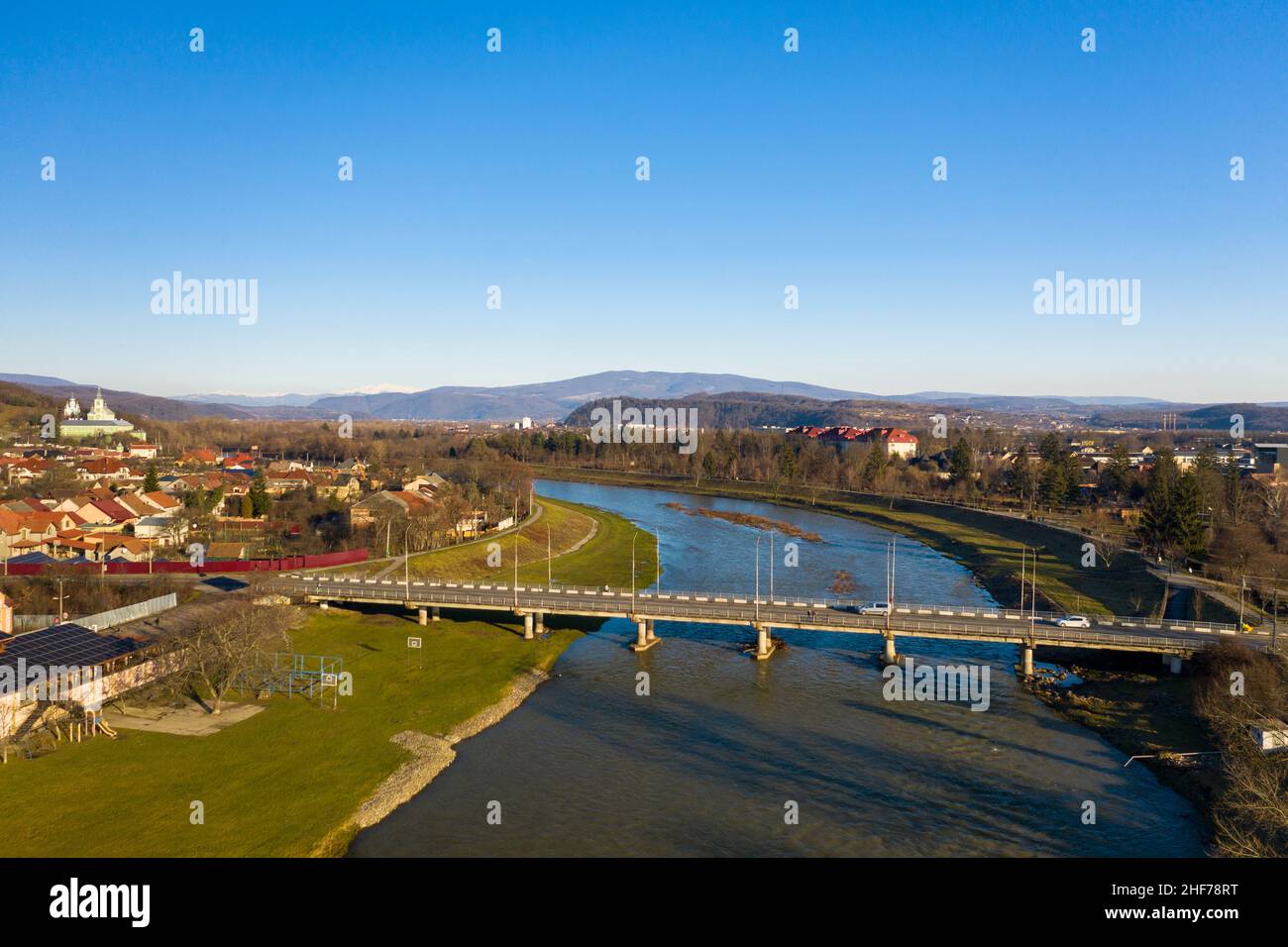 The Mukachevo city center at sunset time with beautiful mountains ...