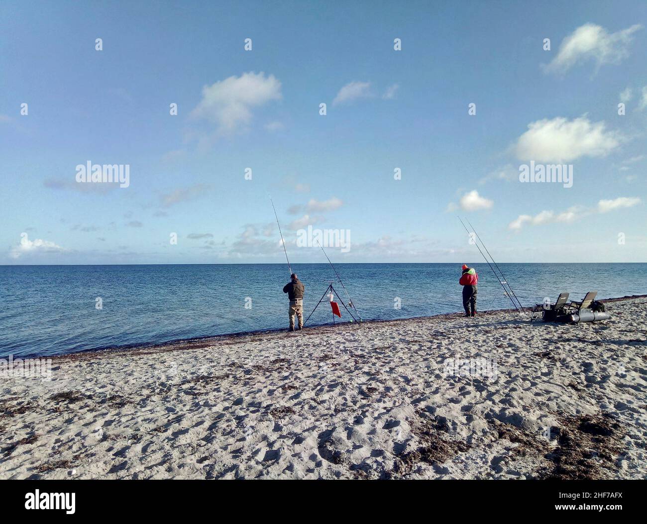 Baltic beach with anglers Stock Photo - Alamy