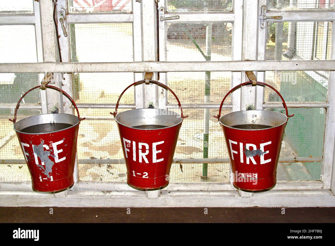 bucket with sand in a tea factory for fire fighting Stock Photo - Alamy